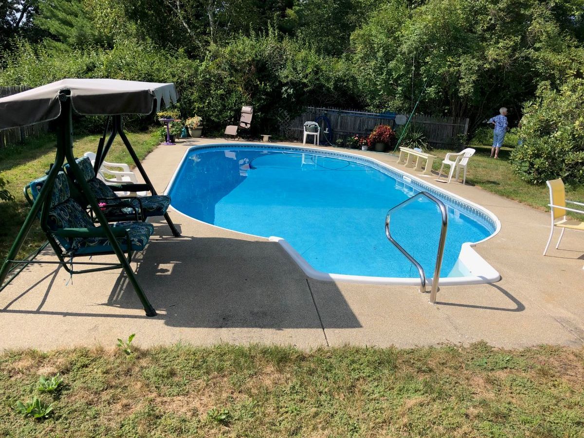 Swimming pool demolition, pool removal with cleanup.