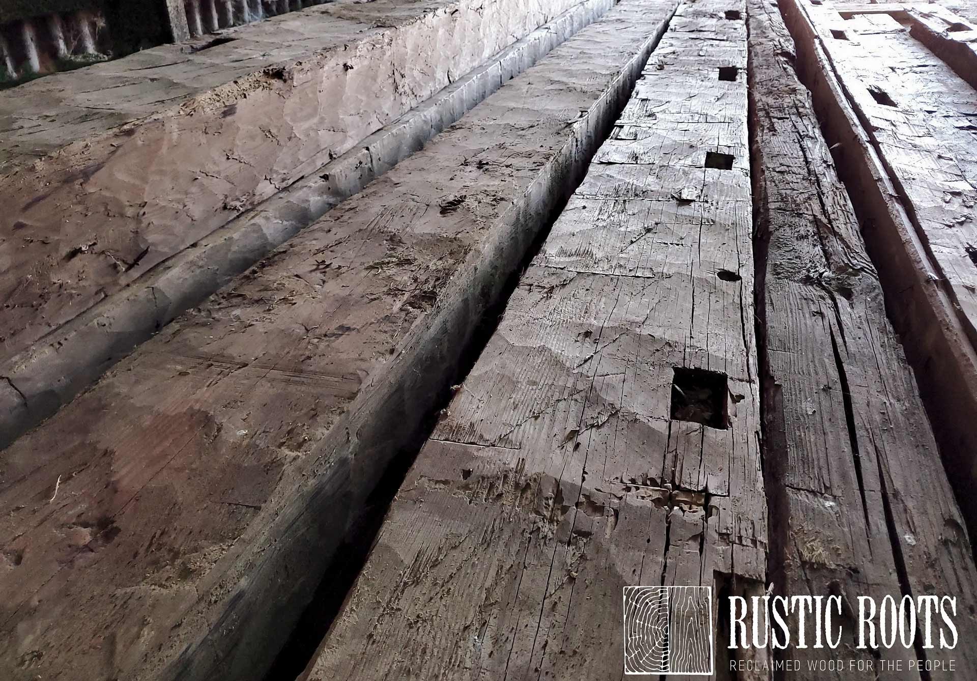 WHAT IS A HAND HEWN RECLAIMED WOOD BEAM MANTEL?