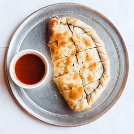 Serving Iowa City Since 1991 Calzones | Sams Pizza Inc