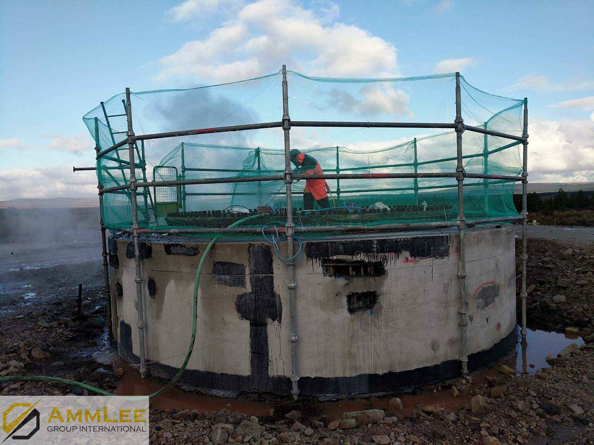 Case Study | Asphalt Drum Hydroblasting Project | AmmLee
