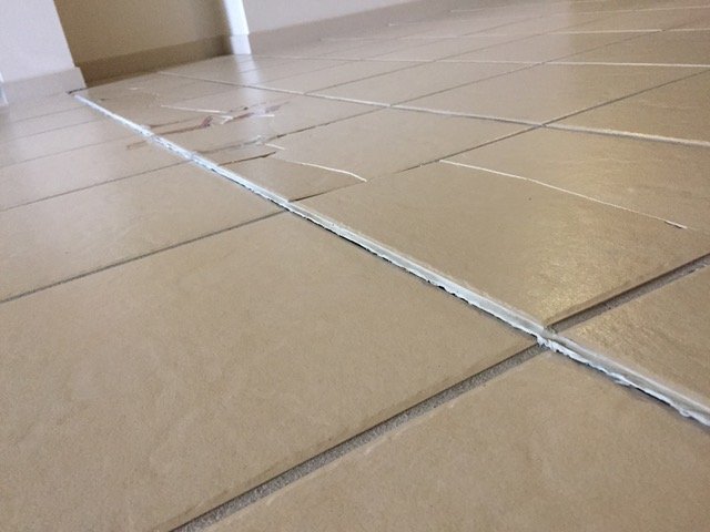 Drummy Tile Repairs | Injectatile Drummy Tile Rectification