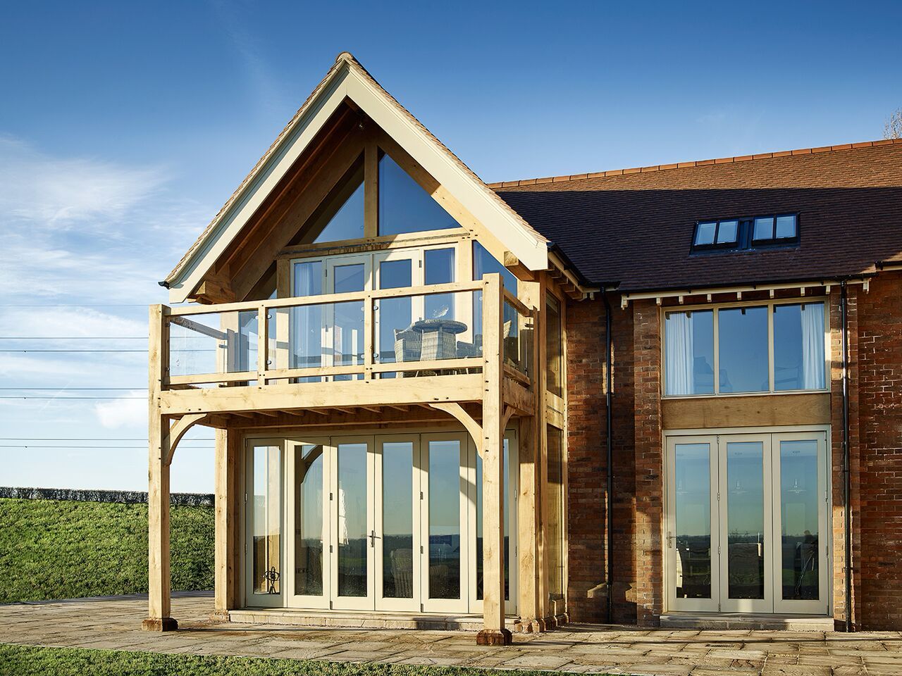 Timber bi-folding bespoke manufactured doors - CPJoinery