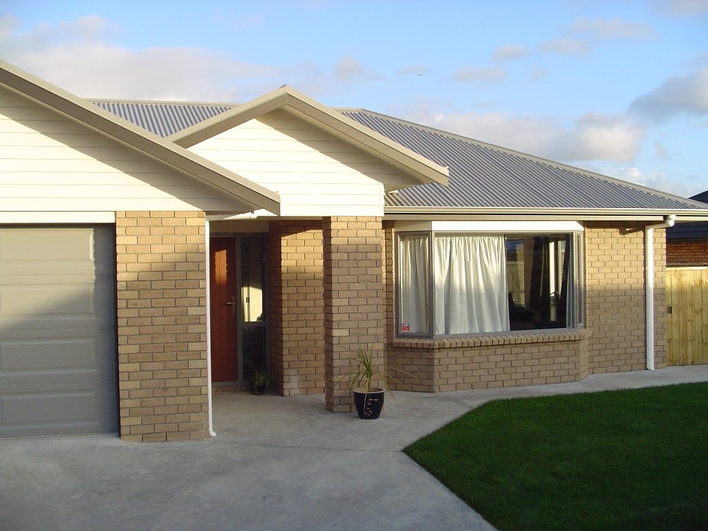 Choosing between brick and timber cladding | Pzazz Building