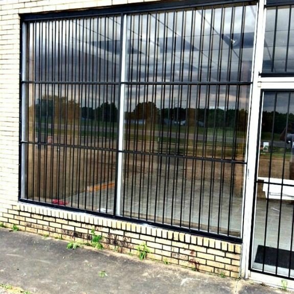 Storefront Window Guards | Midstate Burglar Bars & Ironworks, Inc ...