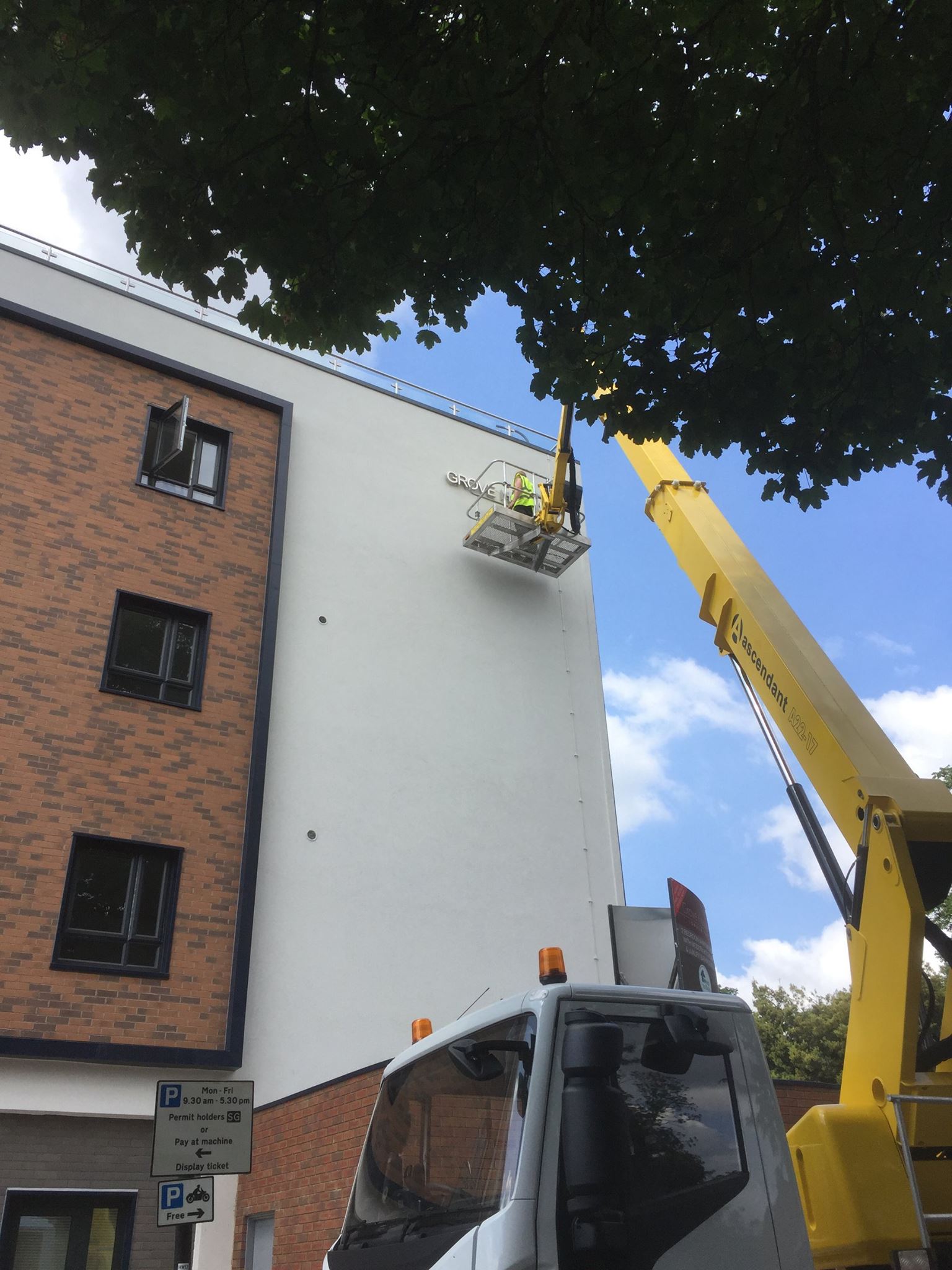 Sing installation │ Signum Signs Cherry Picker Hire