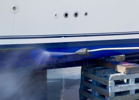 Boat pressure washing by Mark Weeks Marine Services
