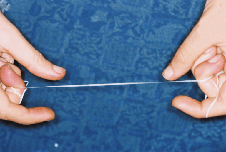 How to Floss Your Teeth - Flushing Family Dentistry