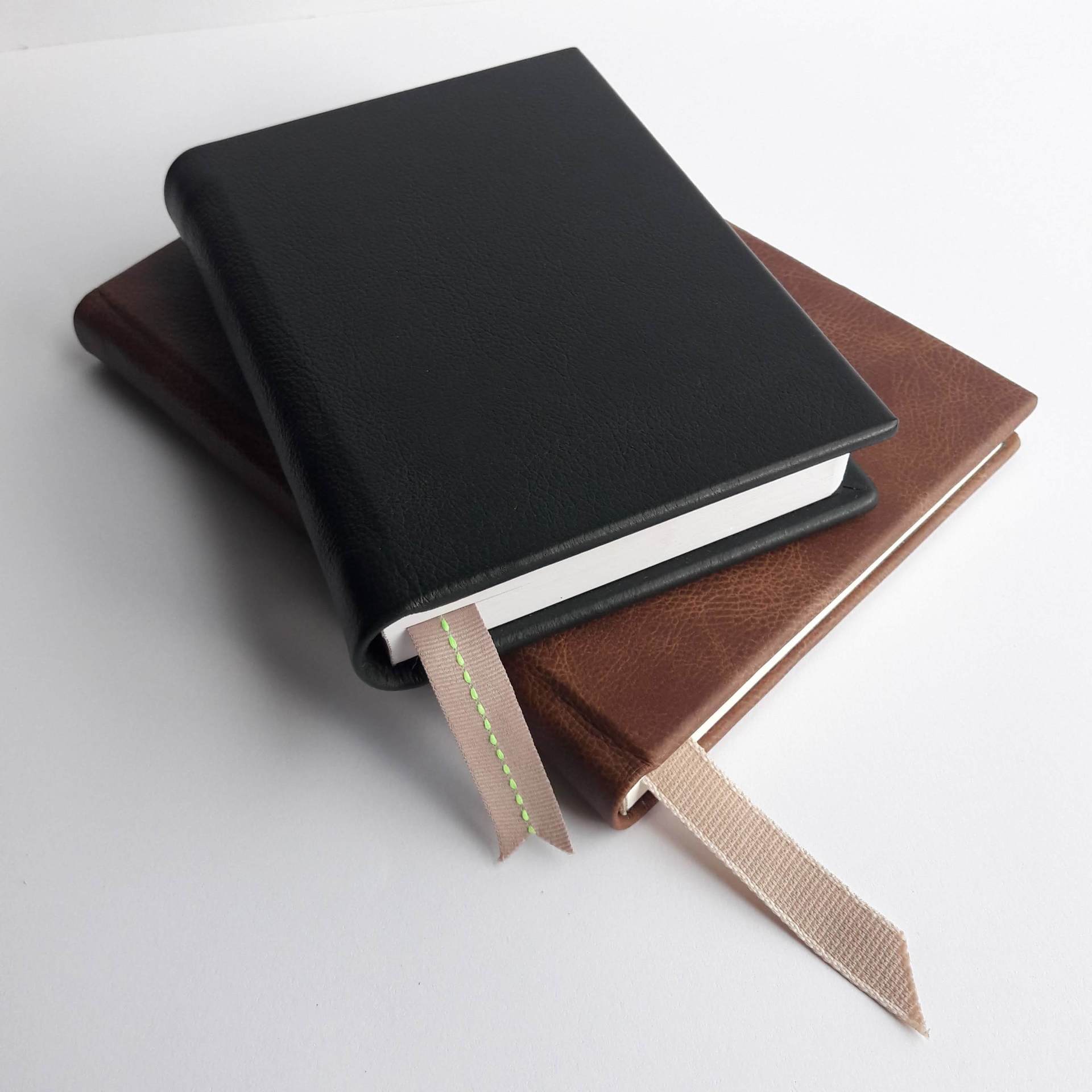 Custom hand bound books with vintage style & sustainability.