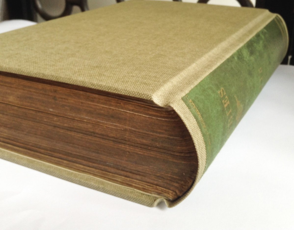 Custom hand bound books with vintage style & sustainability.