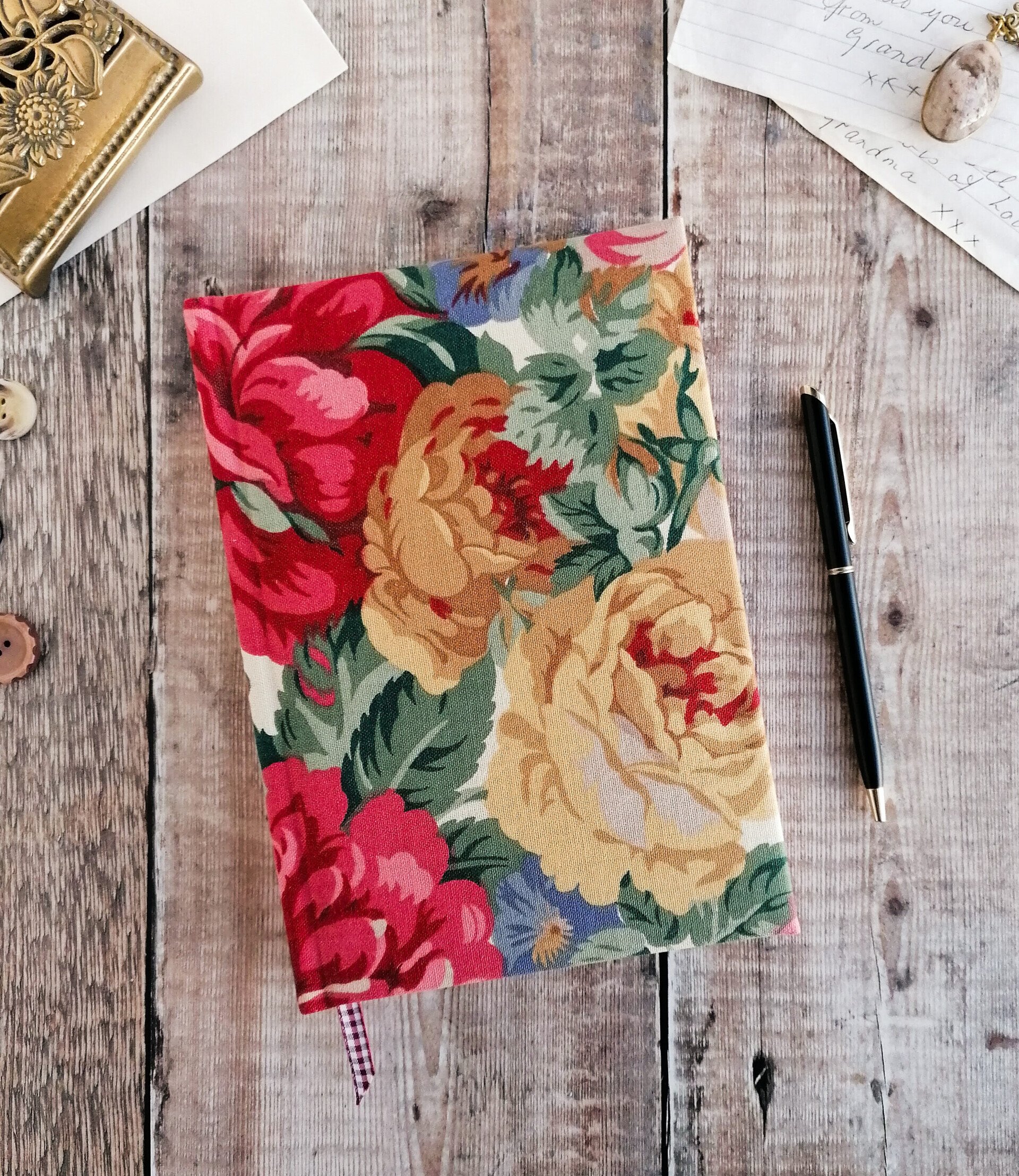 Handmade vintage style books from upcycled fabric and paper.