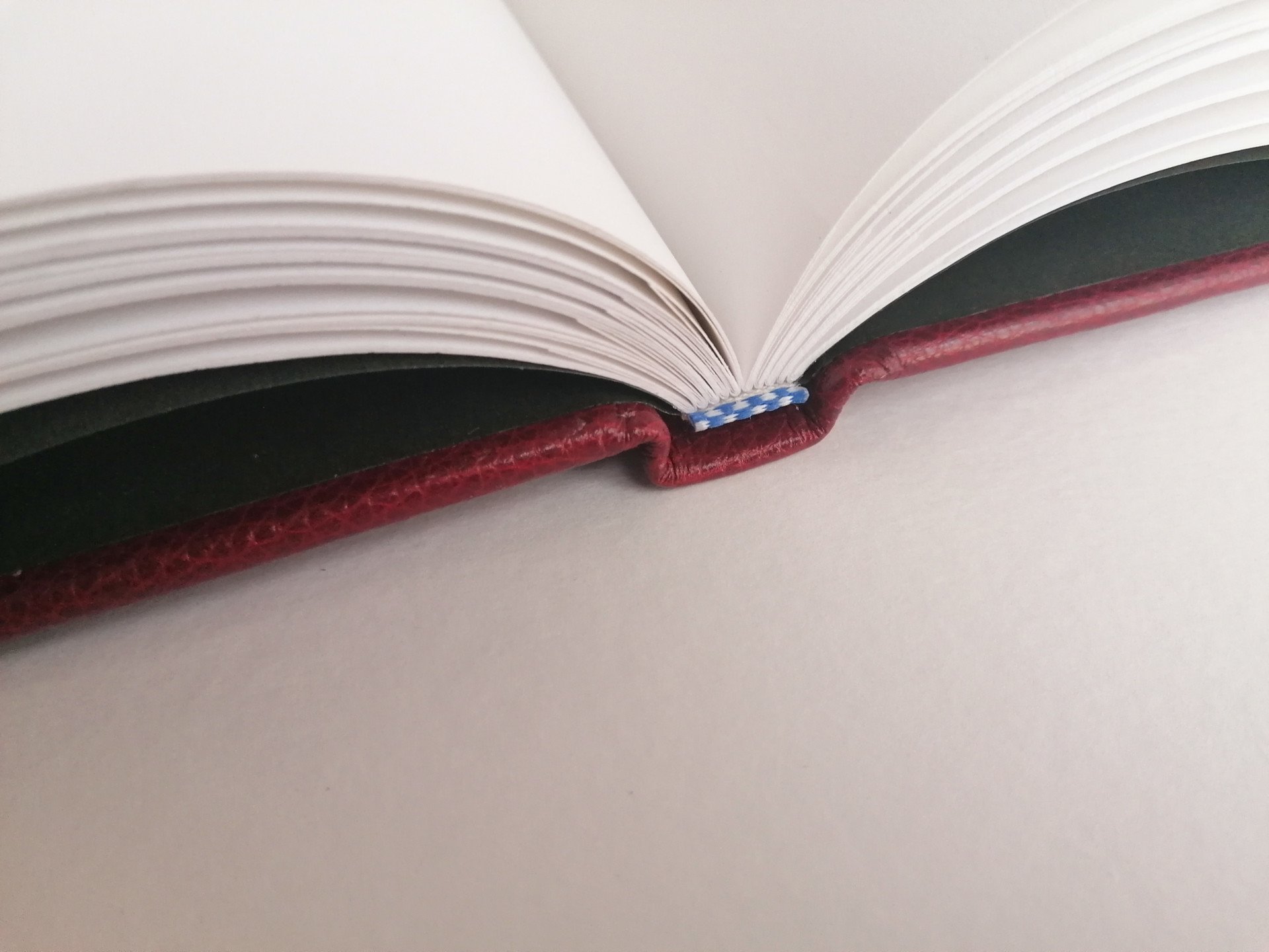 Custom hand bound books with vintage style & sustainability.