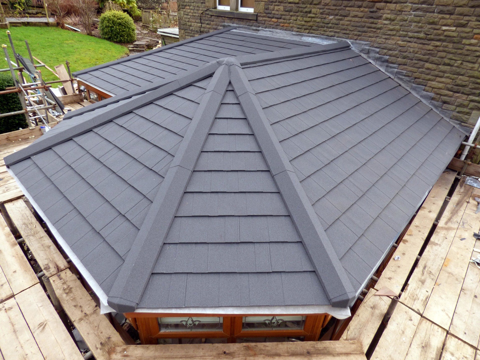 Durable tile roofs for buildings in Swansea