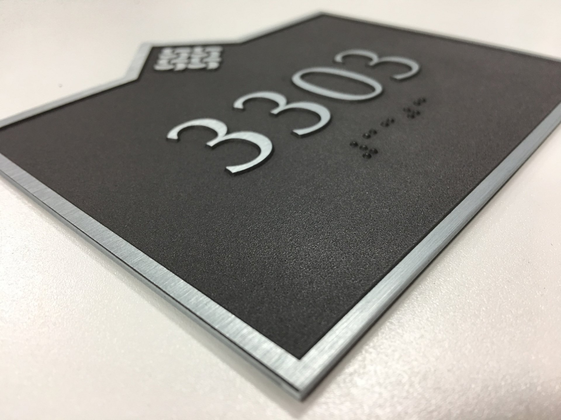 Raised Border and Letters | VisionMark Nameplate Company