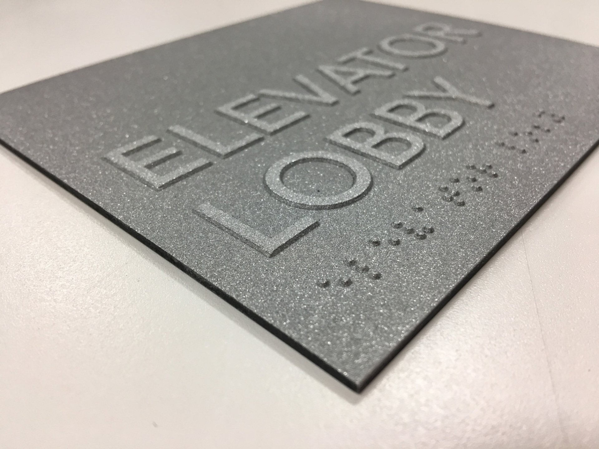 Elevator Lobby Splatter | VisionMark Nameplate Company