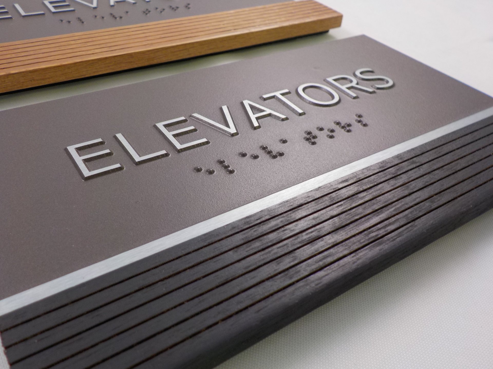 Elevator Wood | VisionMark Nameplate Company