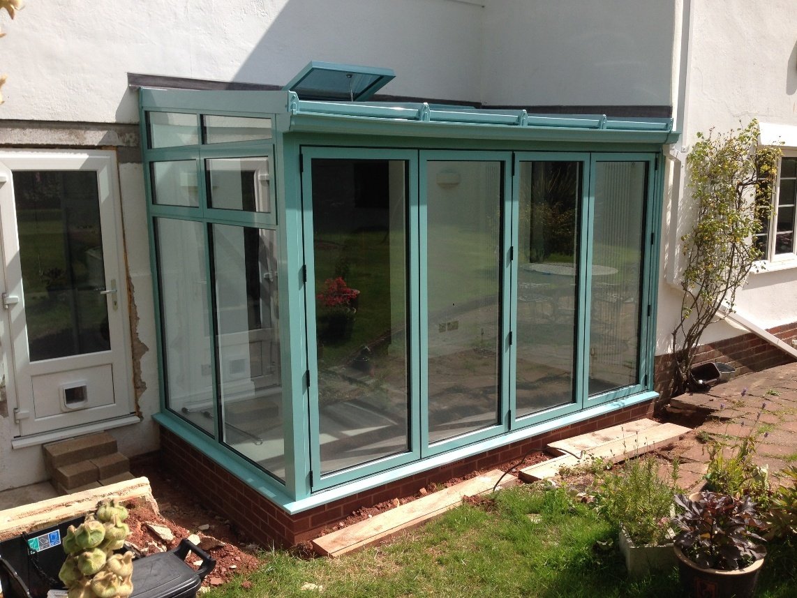 Aluminium conservatories. Aluminium garden room installation in Devon