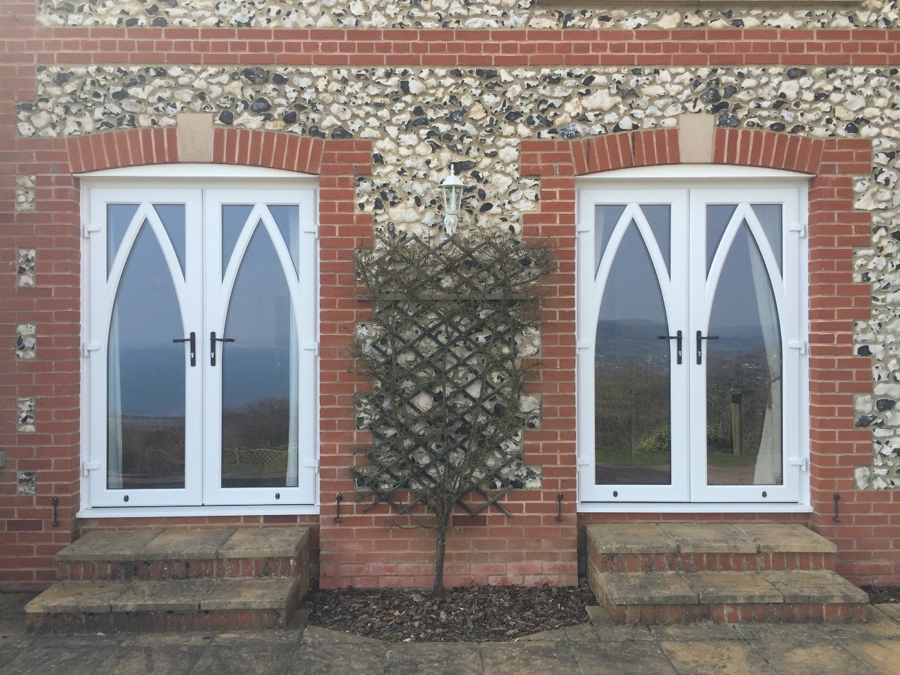 uPVC gothic arched windows in Devon. Shaped PVC double-glazing experts