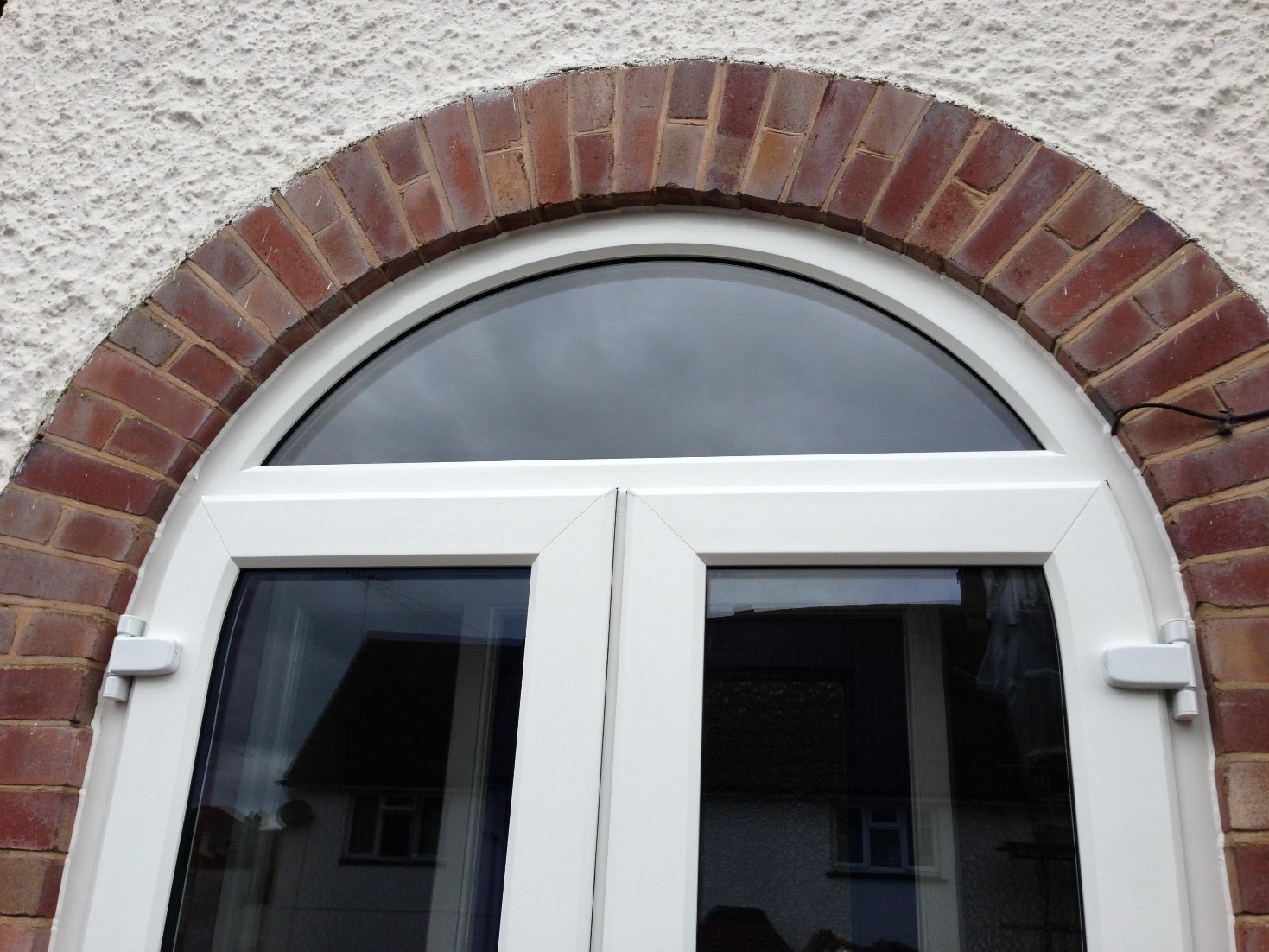 uPVC arched French doors. Curved PVCu porch doors in Devon