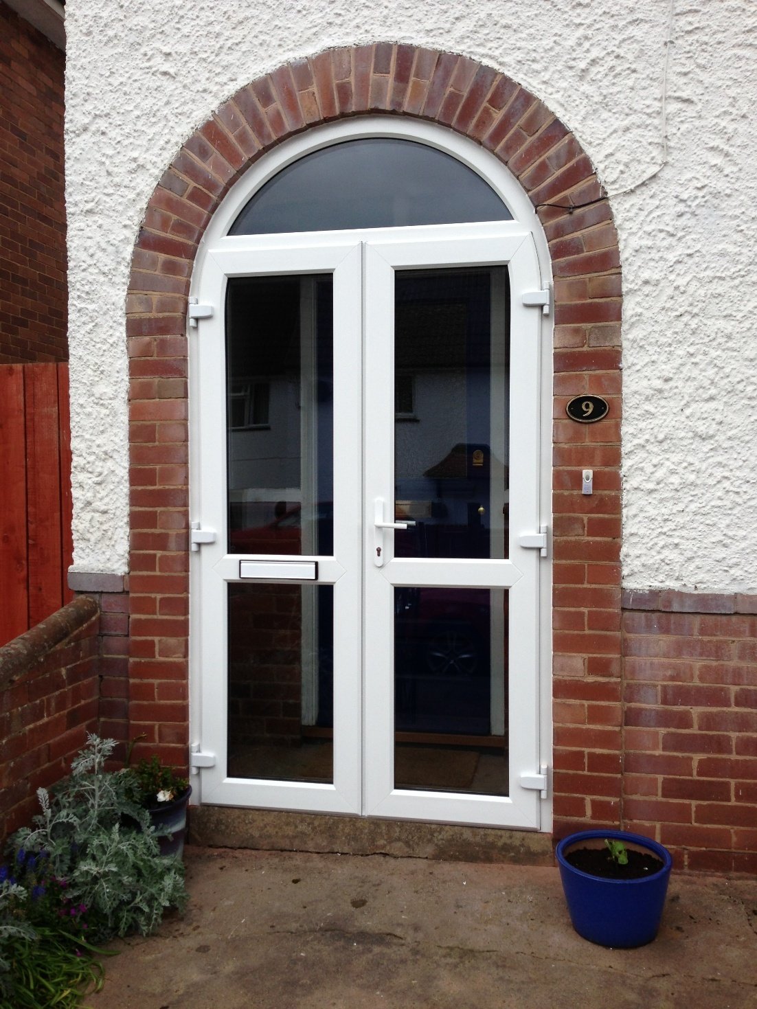 uPVC arched French doors. Curved PVCu porch doors in Devon