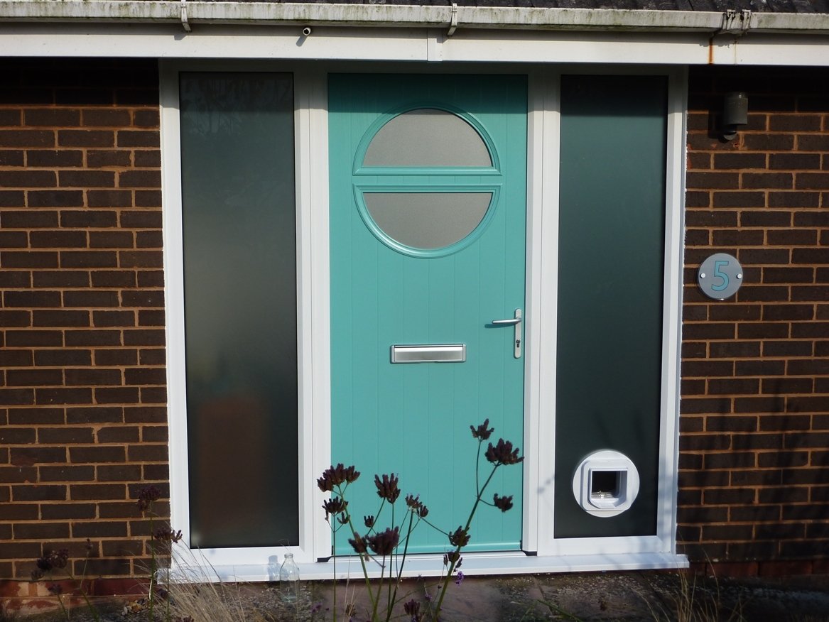 Red secure composite front door installation Exmouth, Devon