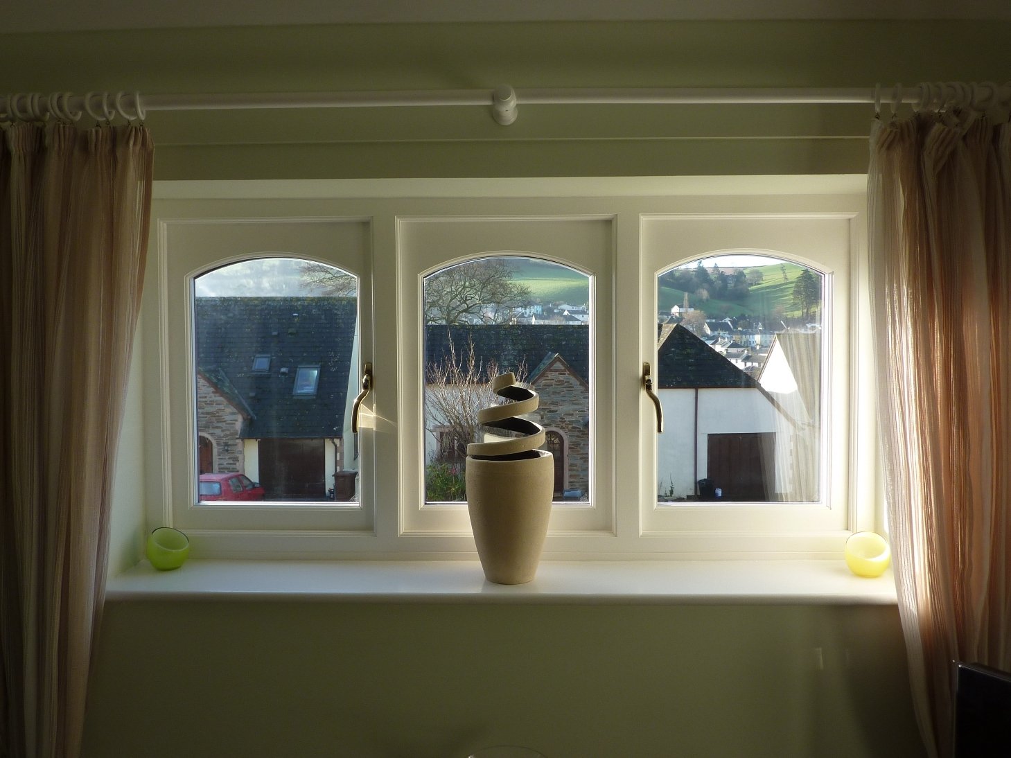 Hardwood crescent head double-glazed replacement windows in Devon