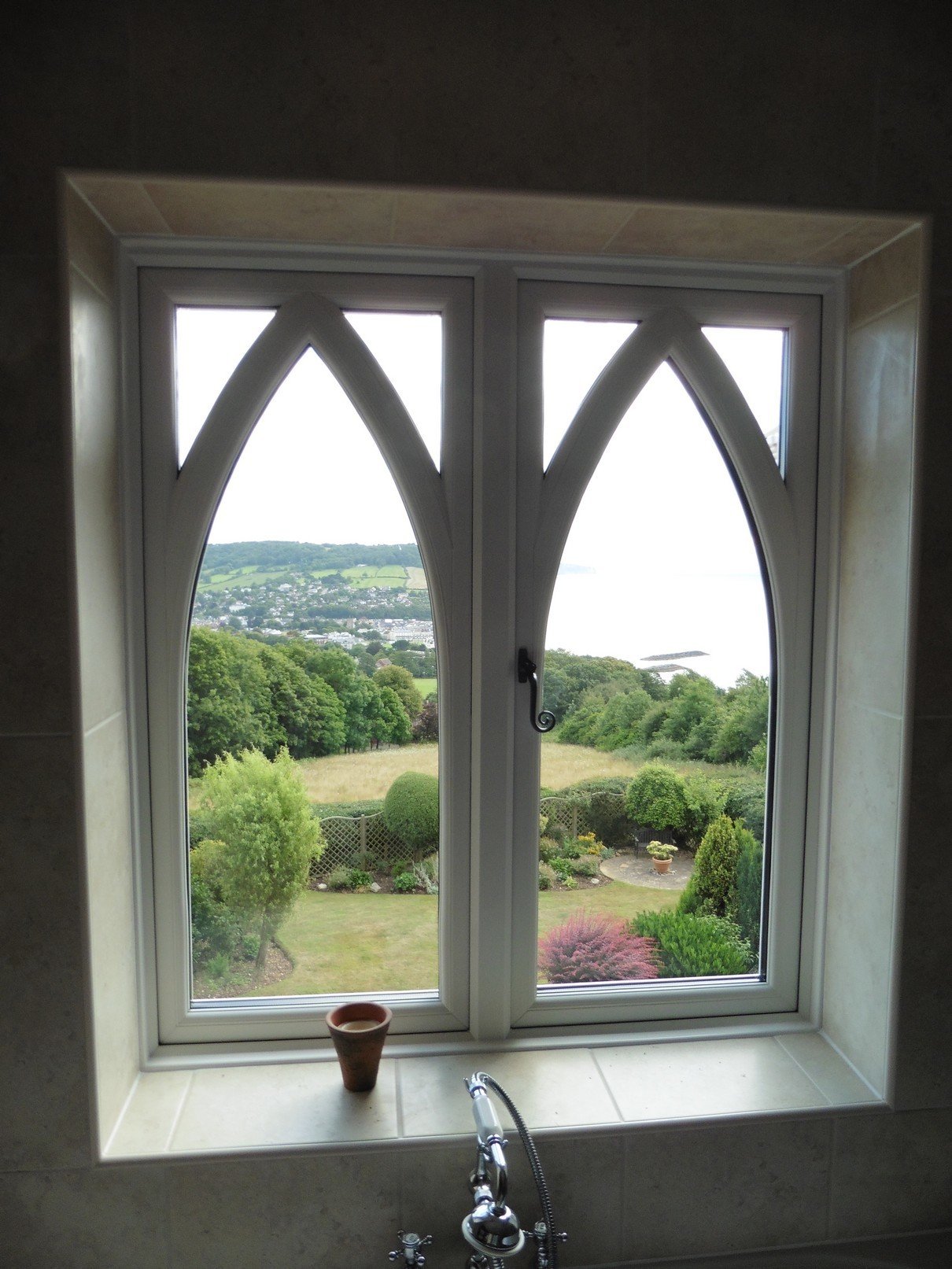 uPVC gothic arched windows in Devon. Shaped PVC double-glazing experts