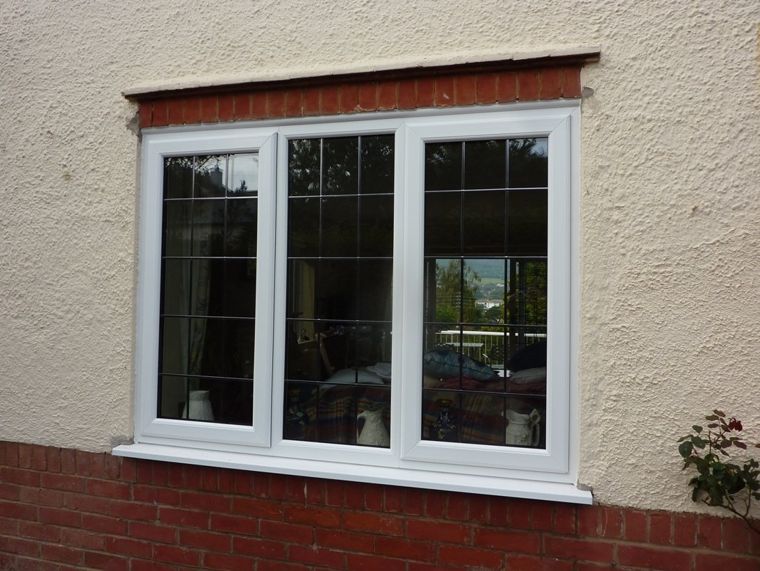 uPVC gothic arched windows in Devon. Shaped PVC double-glazing experts
