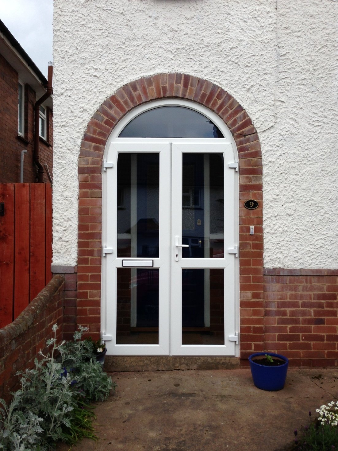 uPVC arched French doors. Curved PVCu porch doors in Devon