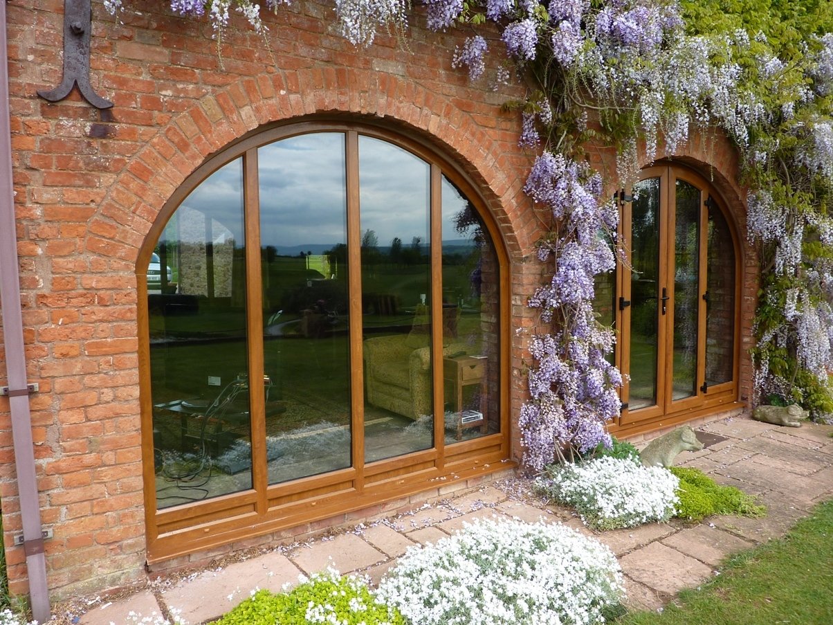 uPVC arched windows. Curved PVCu windows in Devon