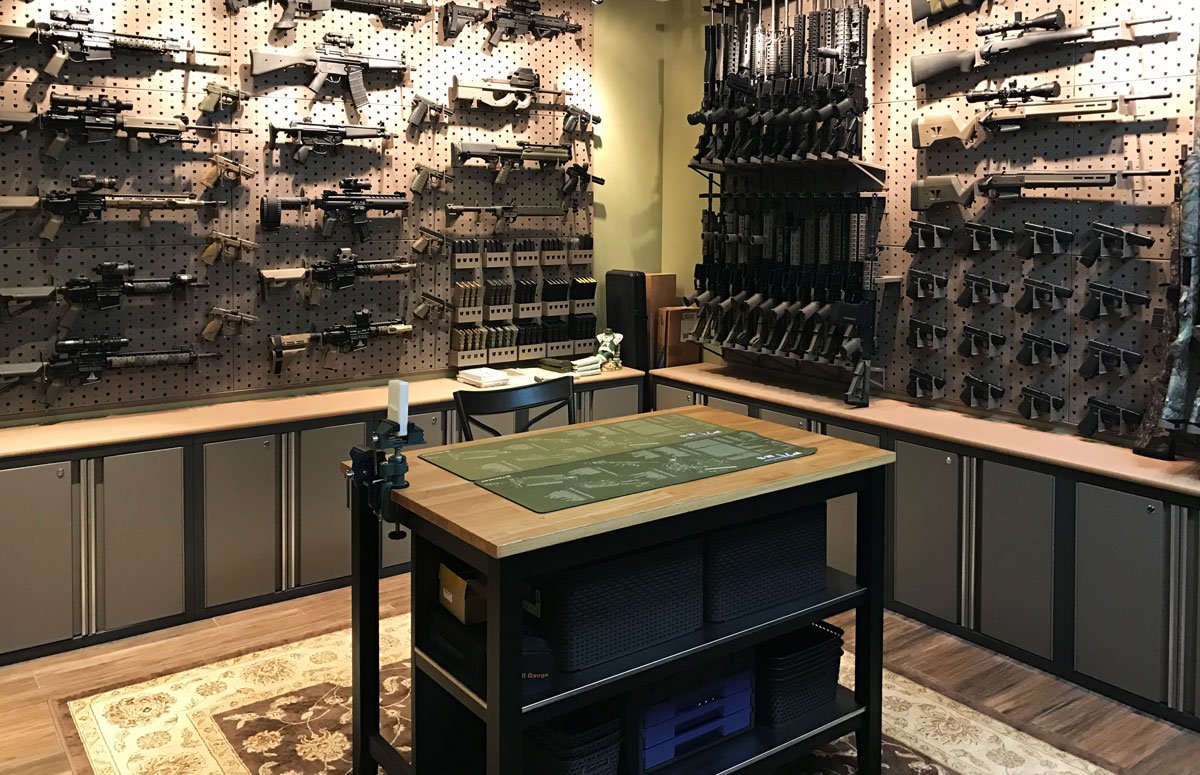 Custom Gun Room Design With Modular Weapons And Gear Storage Racks
