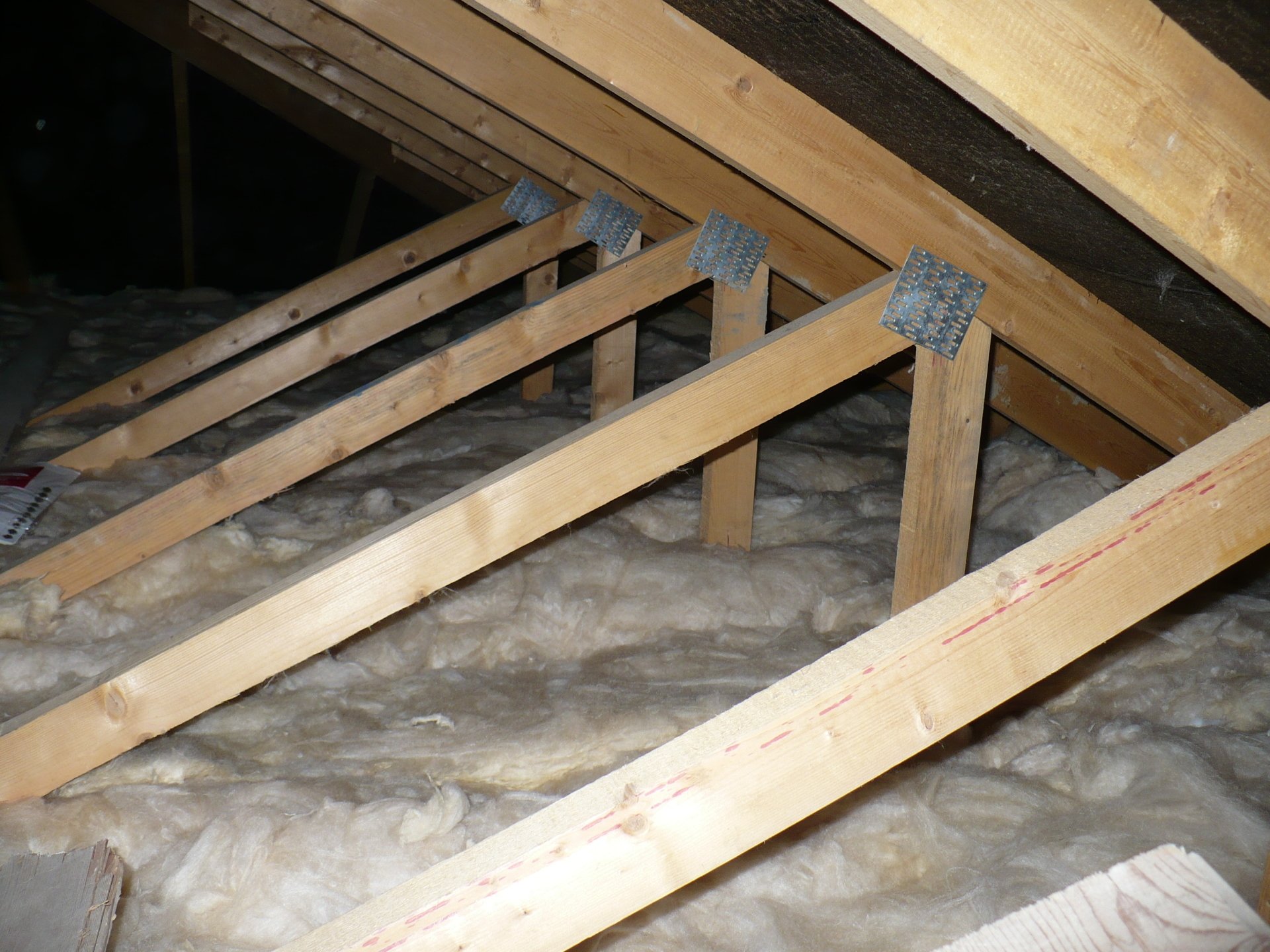Putting attic insulation. Dry-Lining walls insulation.