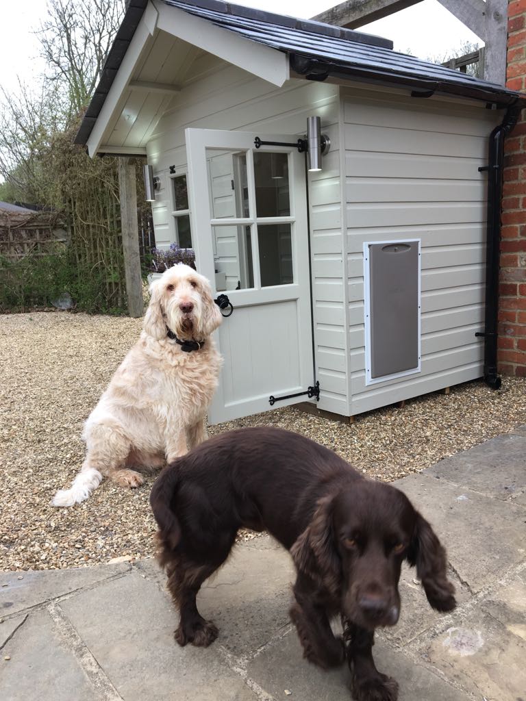 A selection of our beautiful, bespoke heated and lit dog cottages
