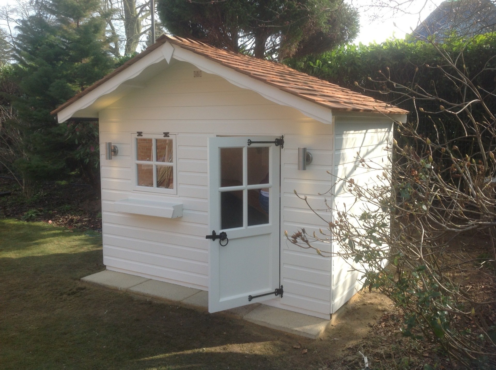 A selection of our beautiful, bespoke heated and lit dog cottages