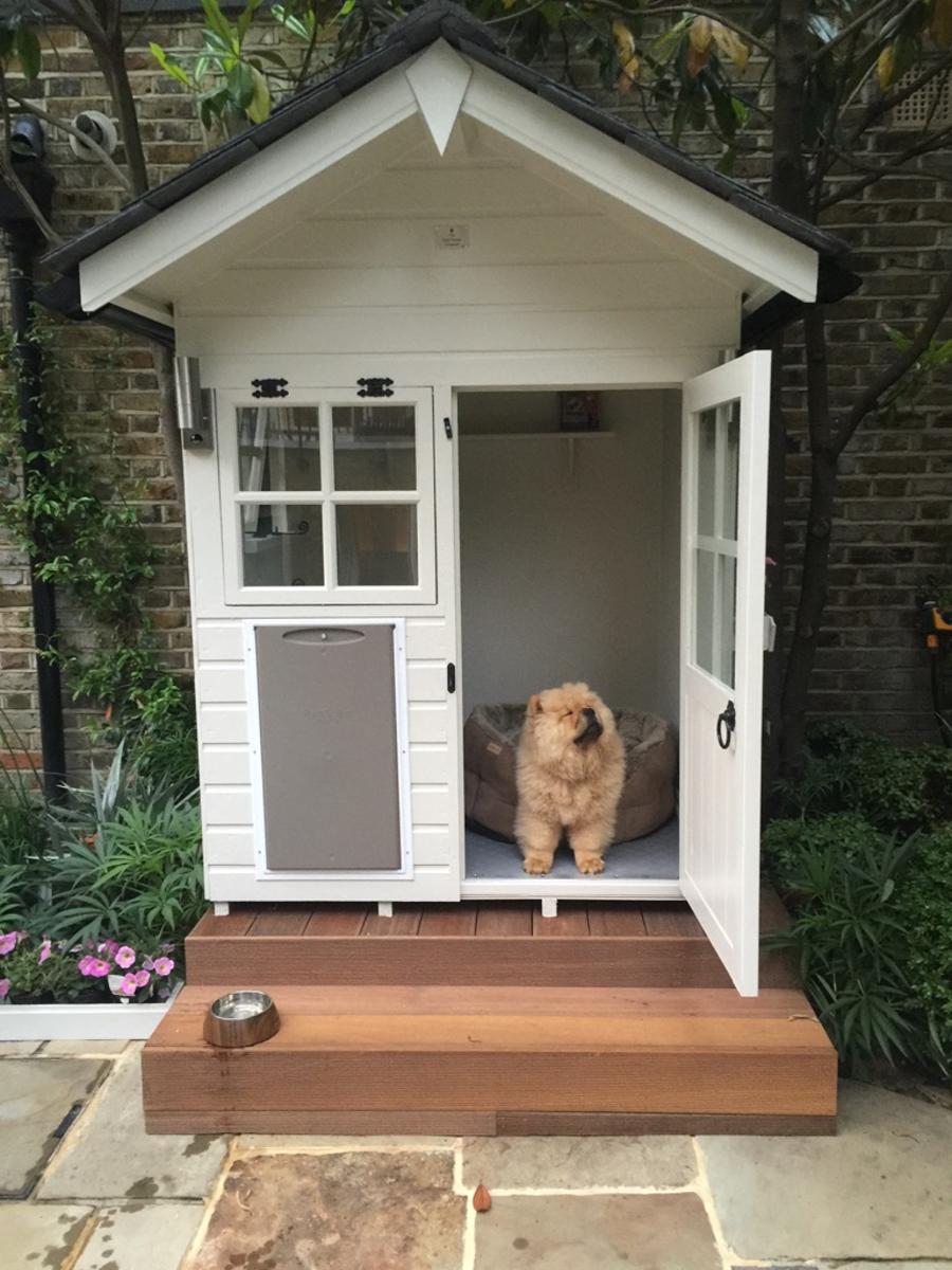 A selection of our beautiful, bespoke heated and lit dog cottages