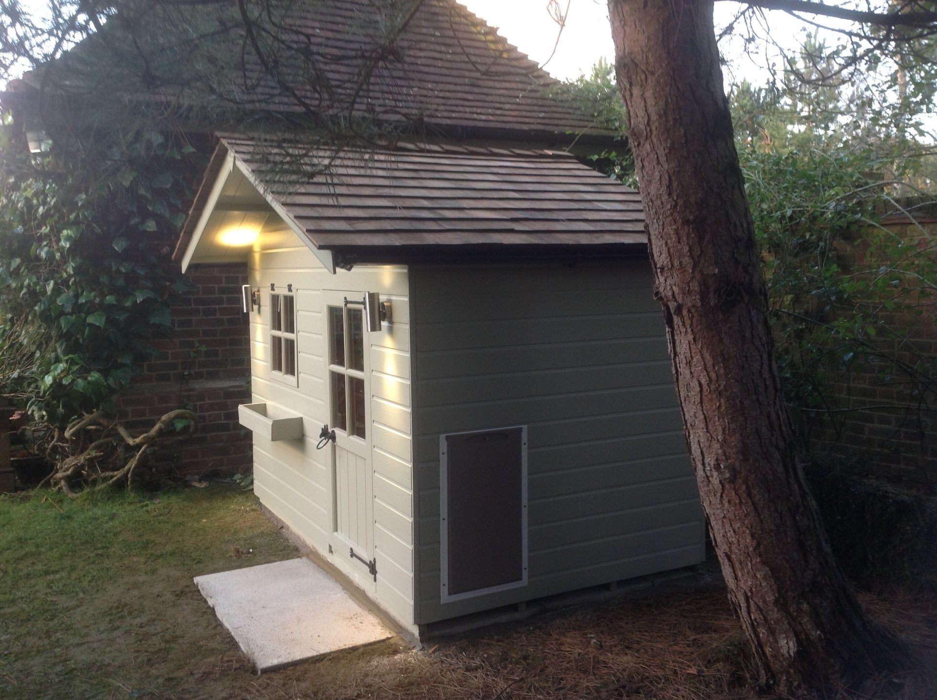 A selection of our beautiful, bespoke heated and lit dog cottages