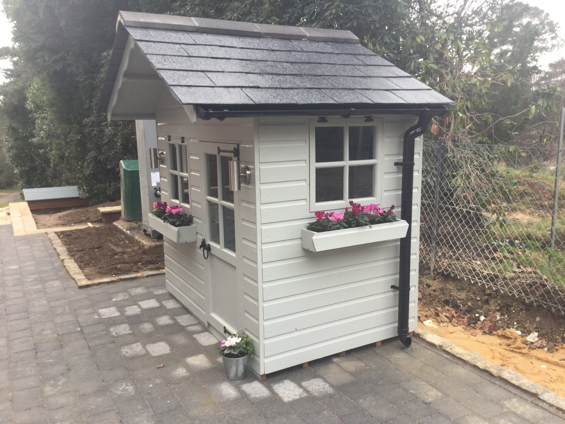 A selection of our beautiful, bespoke heated and lit dog cottages
