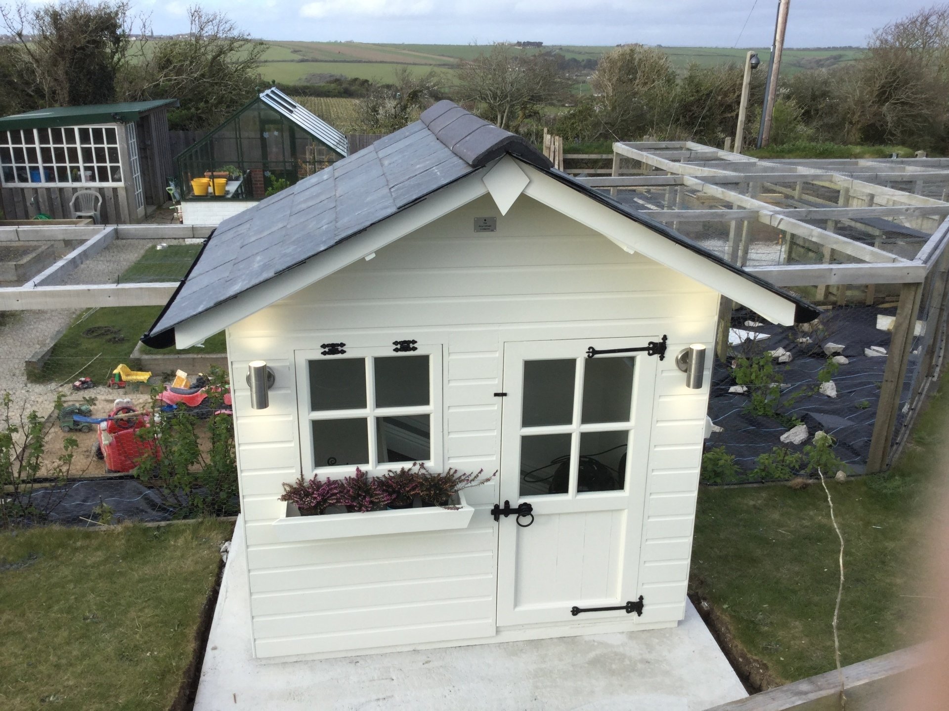 A selection of our beautiful, bespoke heated and lit dog cottages