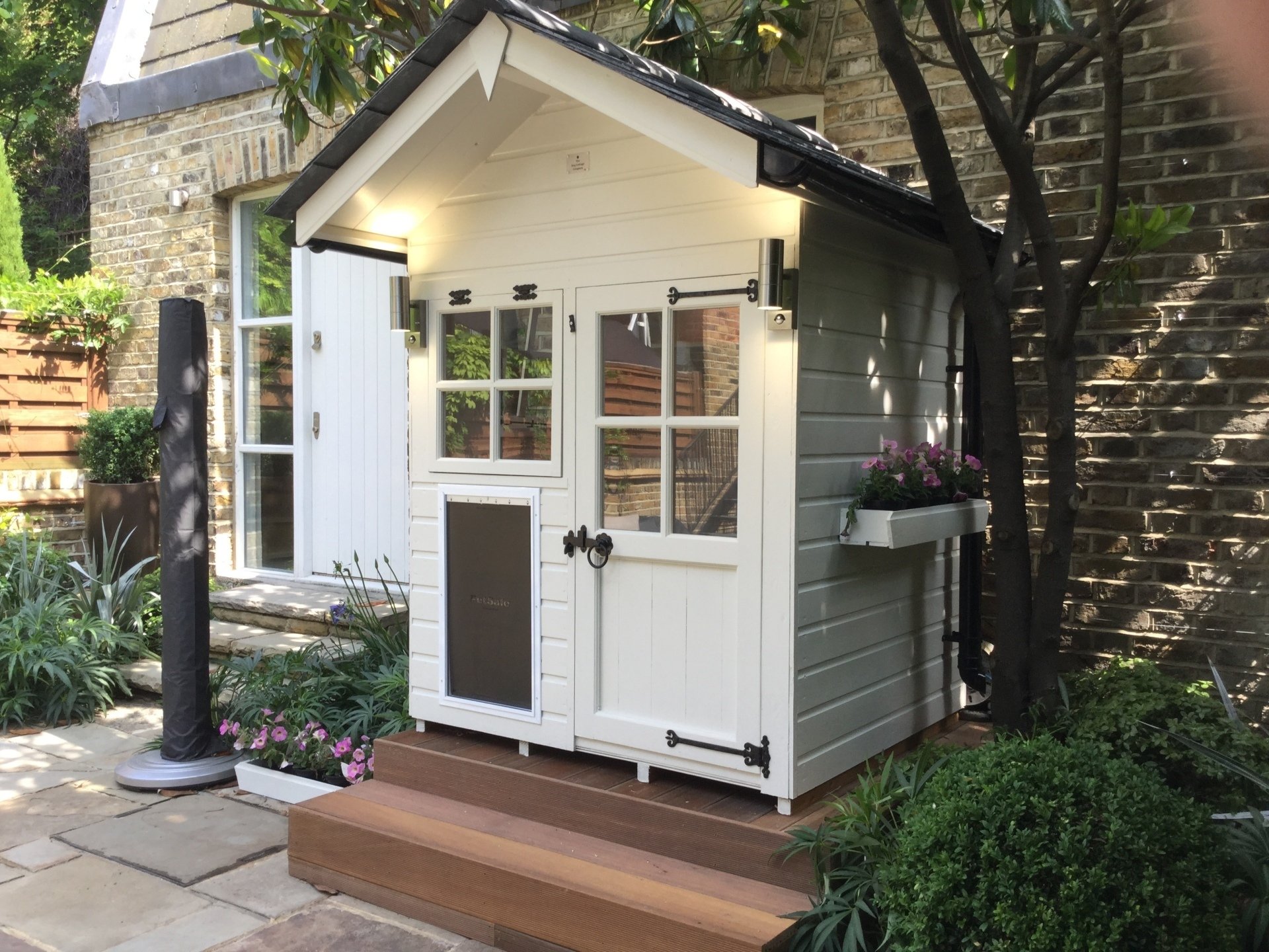 A selection of our beautiful, bespoke heated and lit dog cottages
