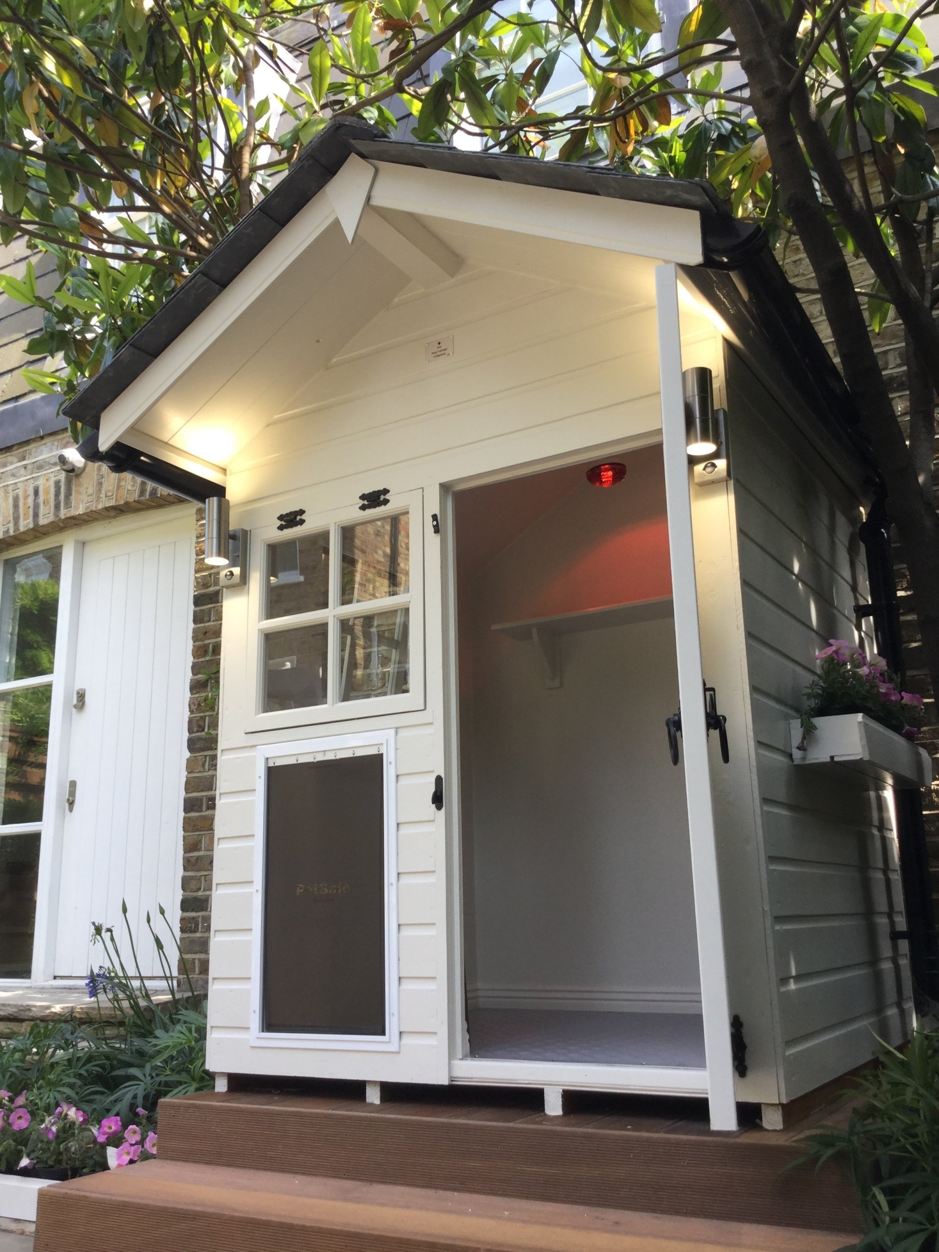 A selection of our beautiful, bespoke heated and lit dog cottages