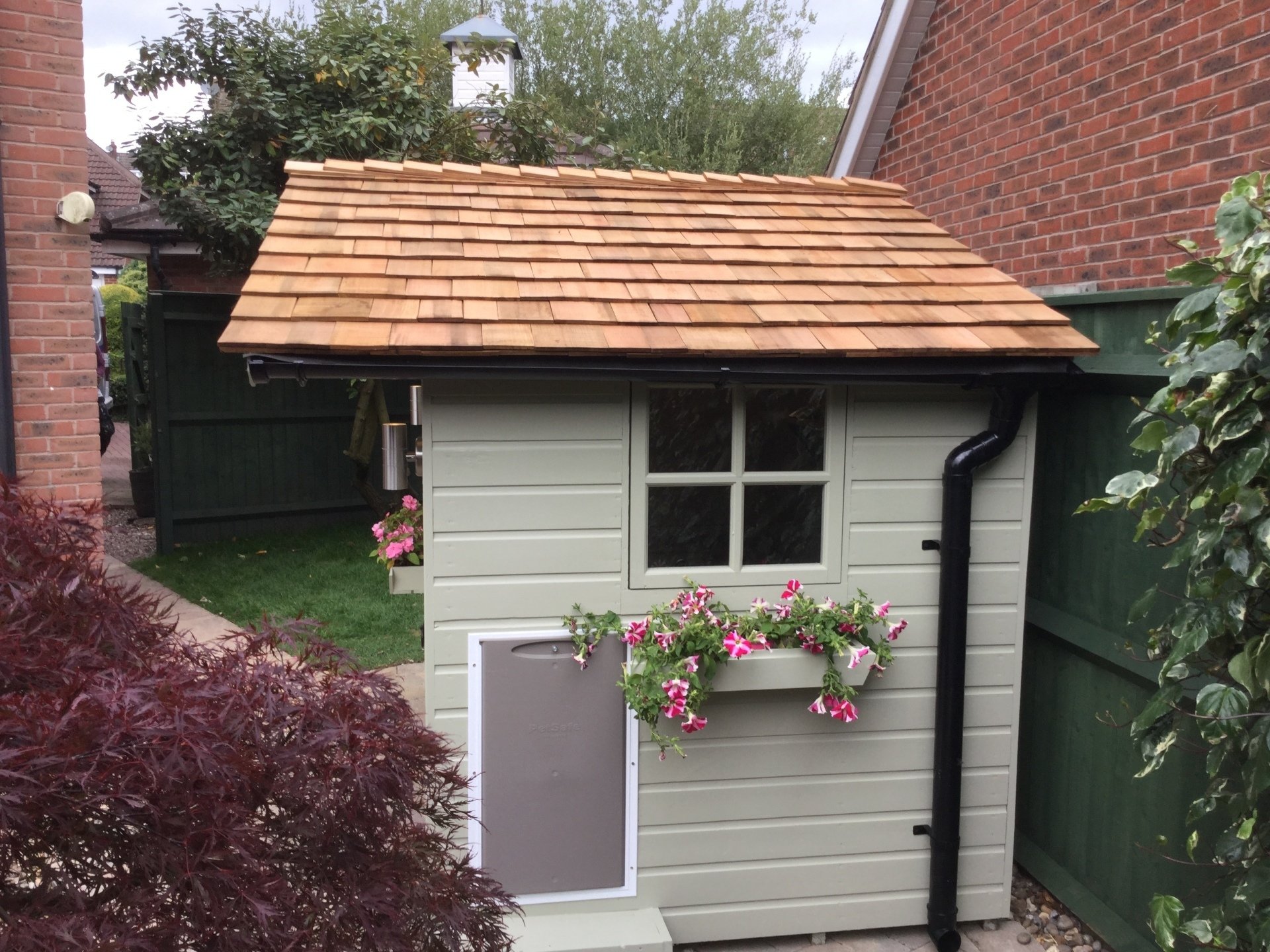 A selection of our beautiful, bespoke heated and lit dog cottages