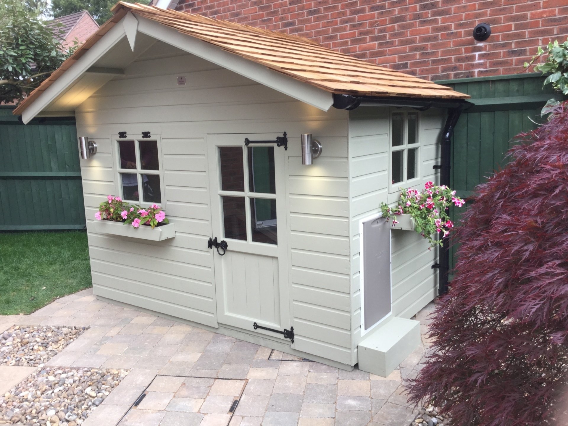 A selection of our beautiful, bespoke heated and lit dog cottages