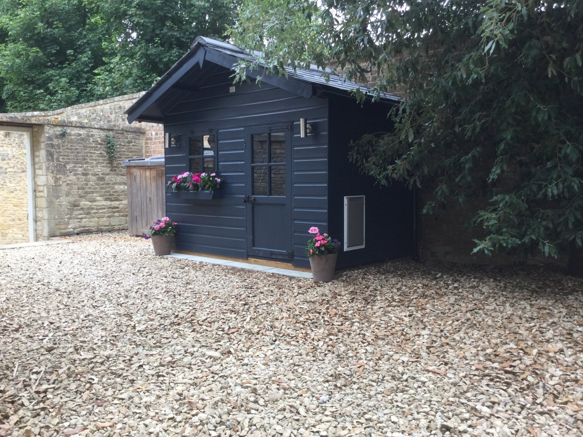 A selection of our beautiful, bespoke heated and lit dog cottages