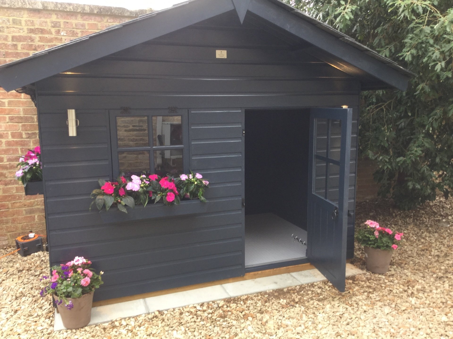 A selection of our beautiful, bespoke heated and lit dog cottages
