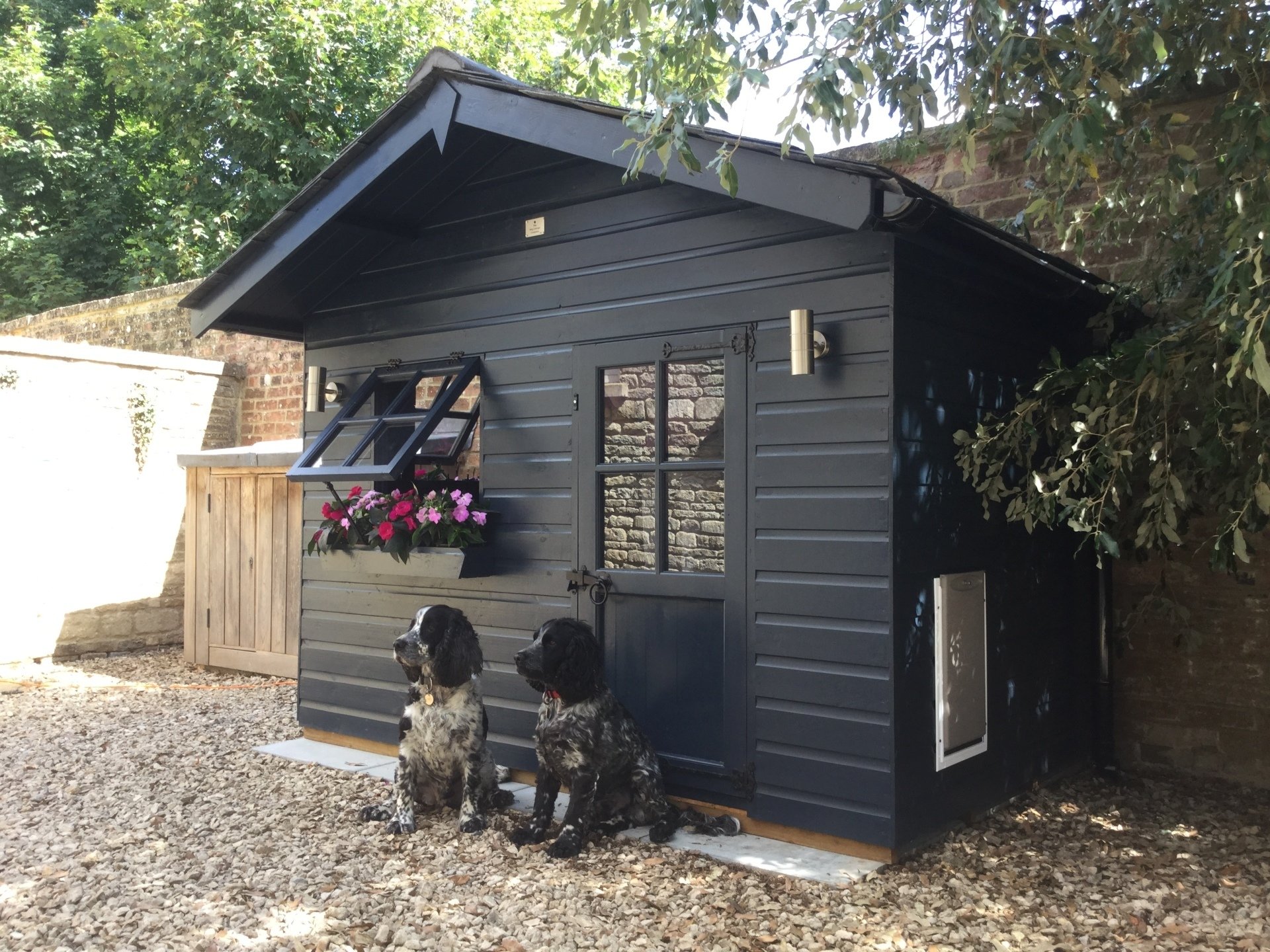 A selection of our beautiful, bespoke heated and lit dog cottages