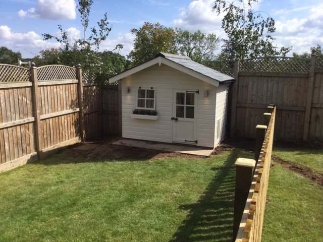A selection of our beautiful, bespoke heated and lit dog cottages