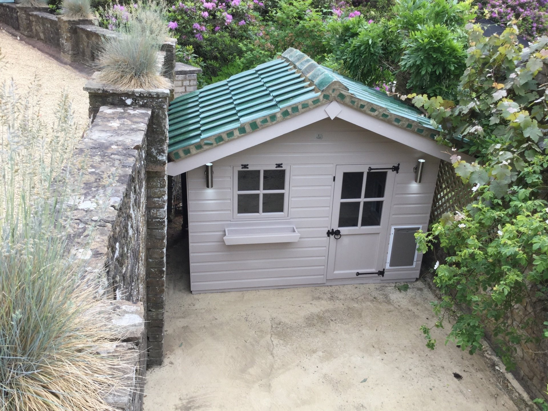 A selection of our beautiful, bespoke heated and lit dog cottages