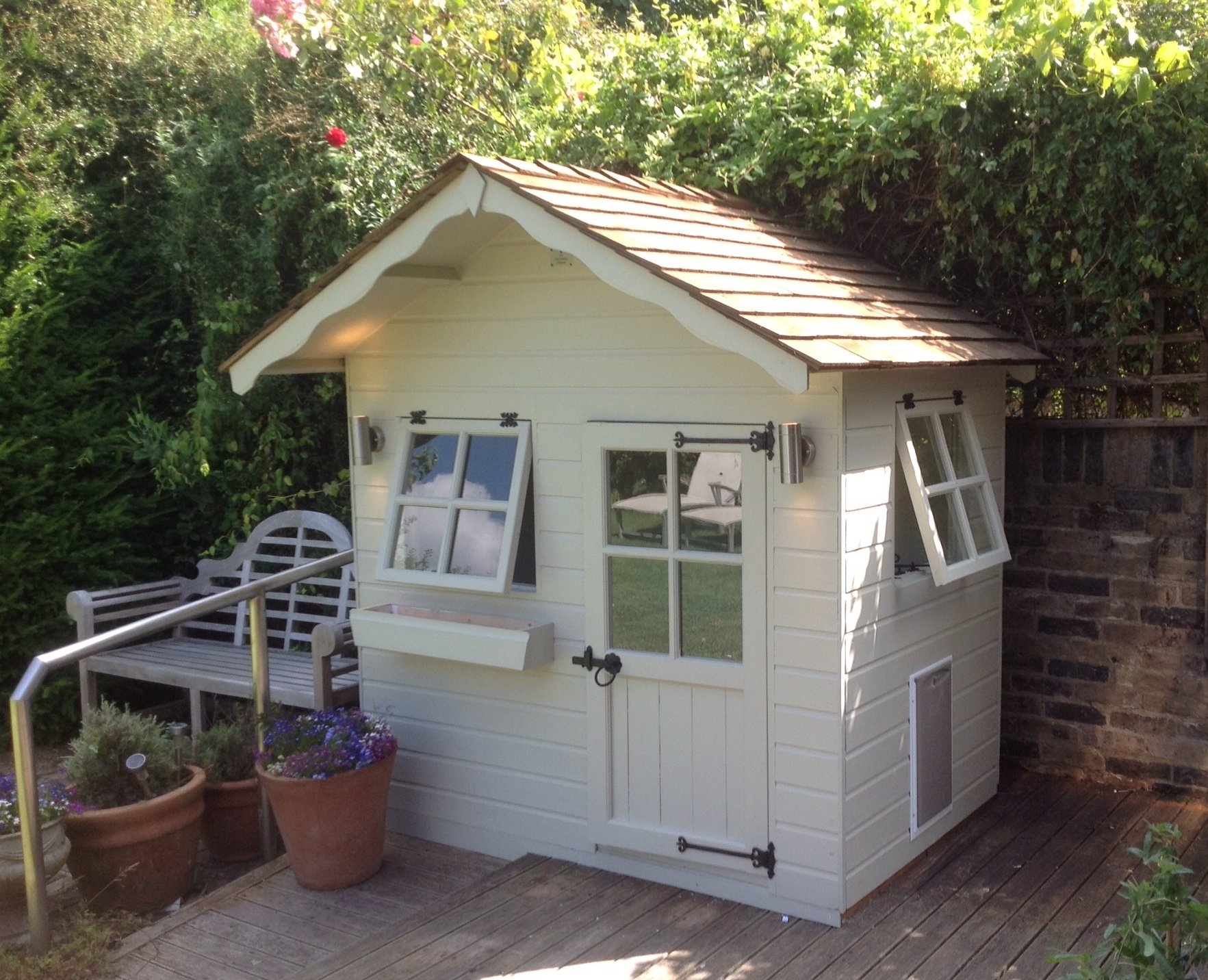 A selection of our beautiful, bespoke heated and lit dog cottages