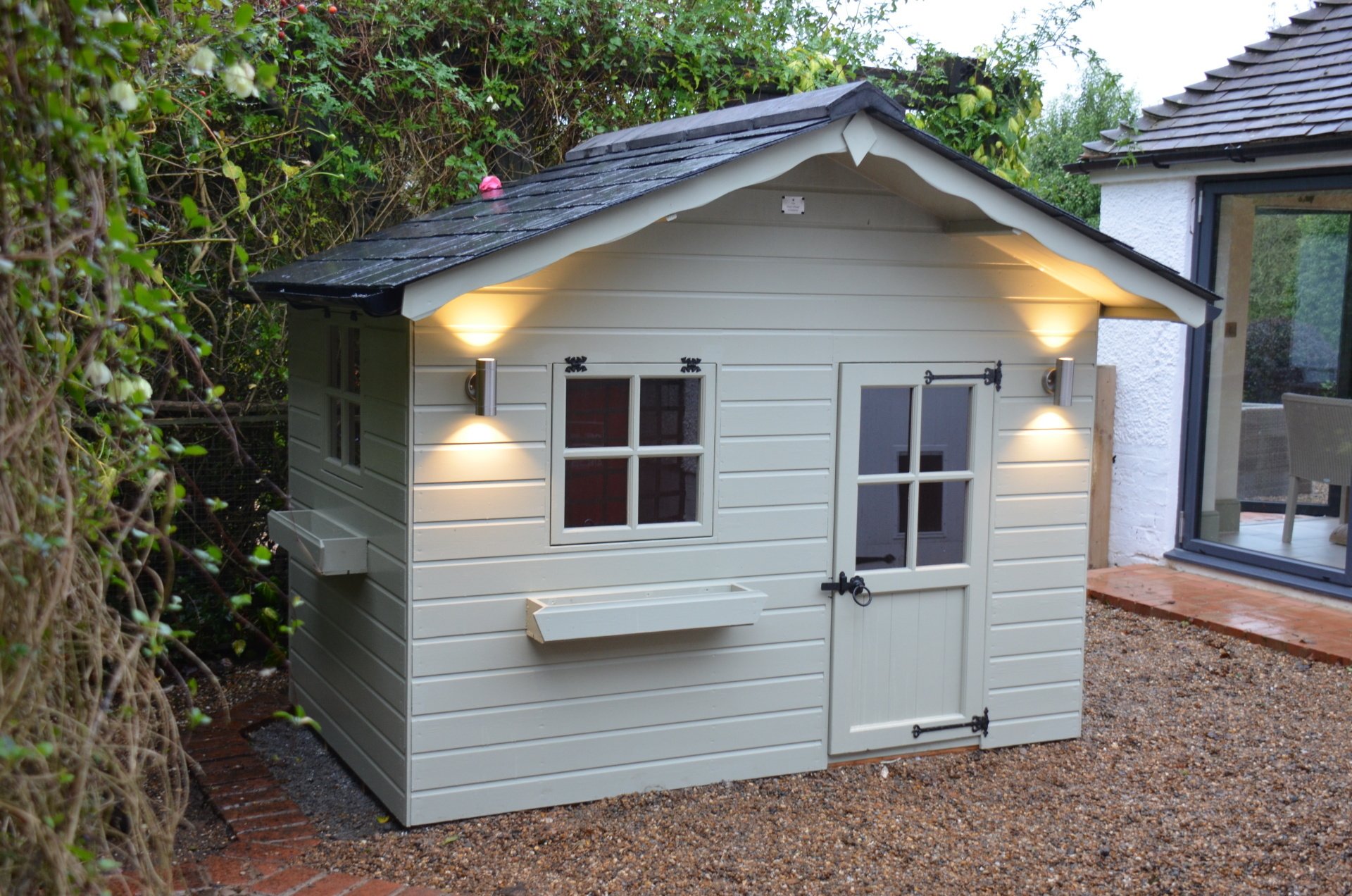 A selection of our beautiful, bespoke heated and lit dog cottages