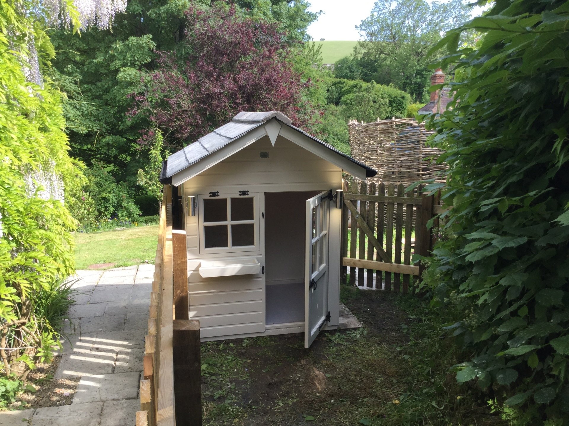 A selection of our beautiful, bespoke heated and lit dog cottages