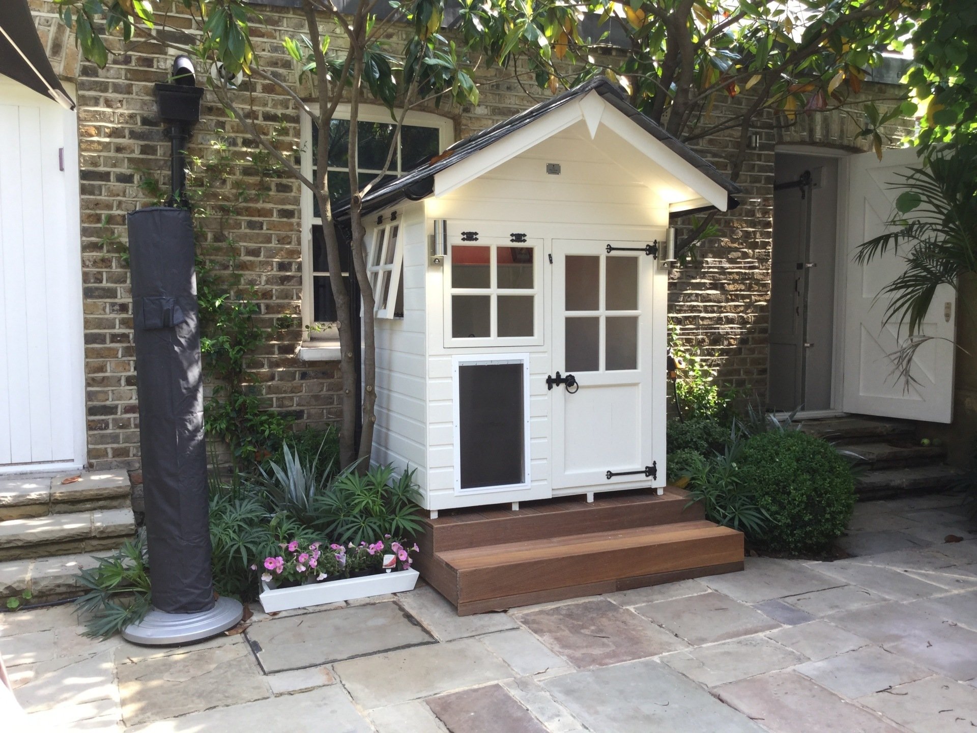 A selection of our beautiful, bespoke heated and lit dog cottages